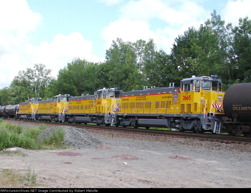 FrRshly outshopped UPY Gensets UPY 2665, 2666, 2667 and 2668 in transit at CP382